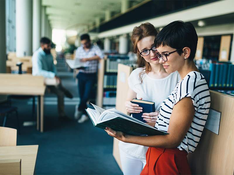 Students-in-library.jpg - Hanover Research